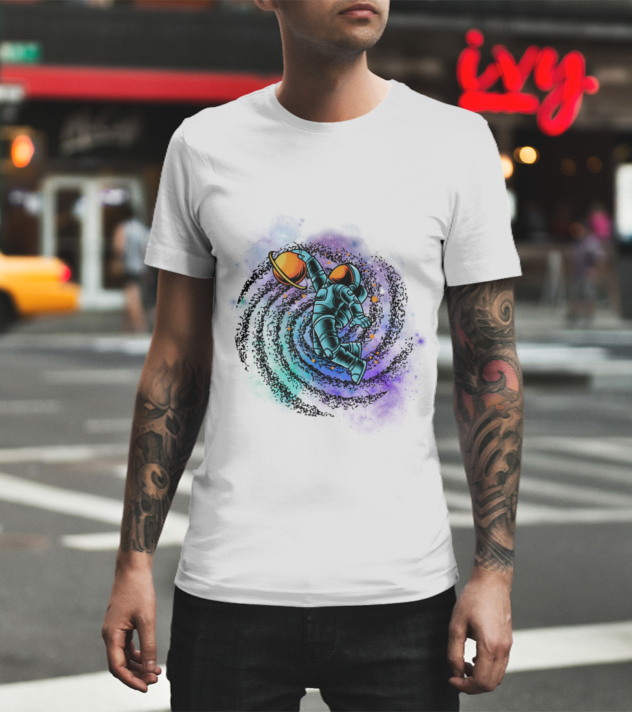Astronaut Grasping Saturn In Cosmic Swirl 'Conquer The Universe' T-Shirt