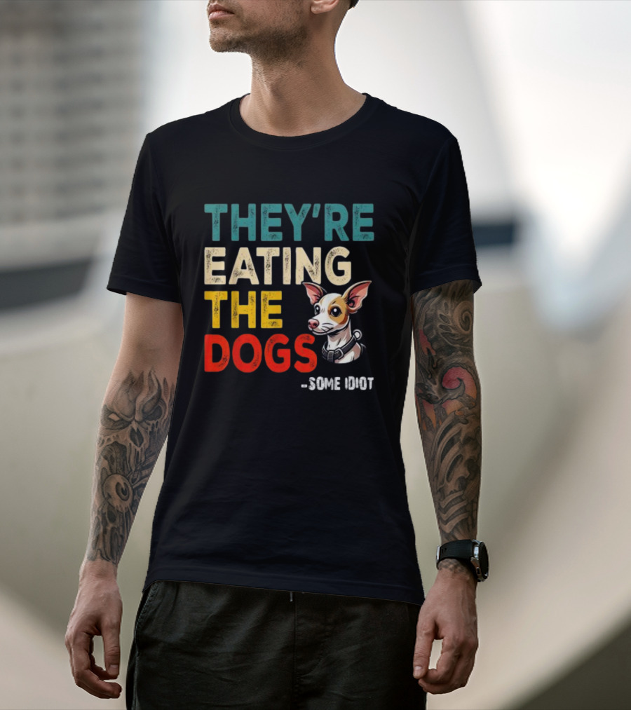 THEY’RE EATING THE DOGS - SOME IDIOT T-Shirt