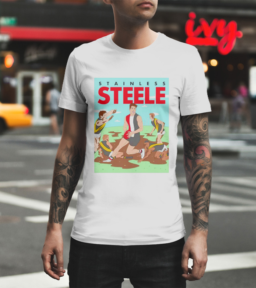 Stainless Steele AFL Football Hero In Action On Muddy Field T-Shirt