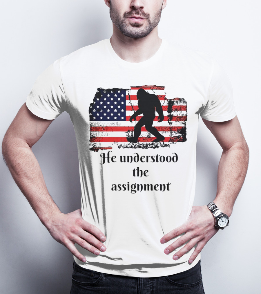 Bigfoot Silhouette With Distressed American Flag He Understood The Assignment T-Shirt