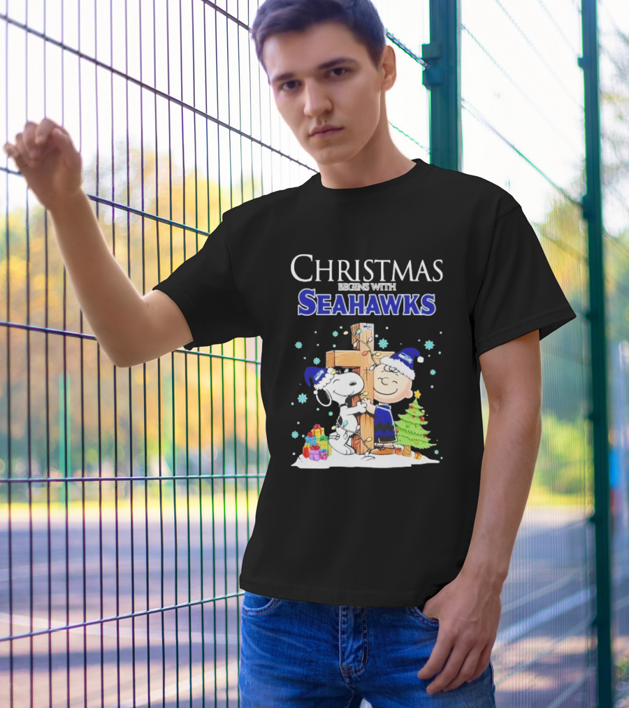Christmas Begins With Seahawks Charlie Brown Snoopy Jesus Cross T-Shirt