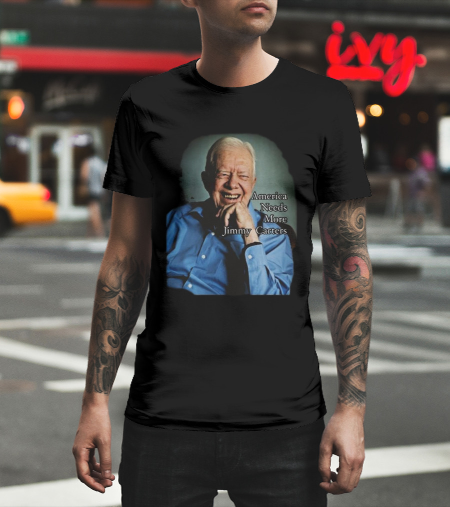 Norbert Leo Butz America Needs More Jimmy Carters Image With Smiling Elderly Man In Blue T-Shirt