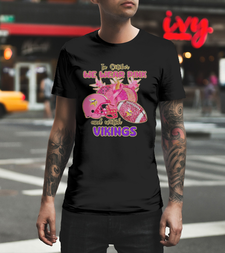 In October We Wear Pink And Watch Vikings Football Helmets Breast Cancer Awareness T-Shirt