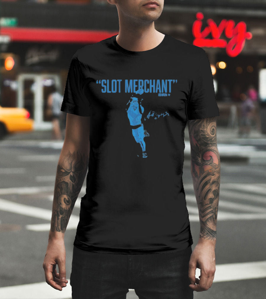 Amon-Ra St. Brown Slot Merchant Catching Football In Blue T-Shirt