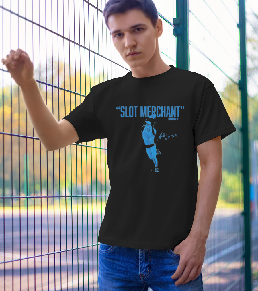 Amon-Ra St. Brown Slot Merchant Catching Football In Blue T-Shirt