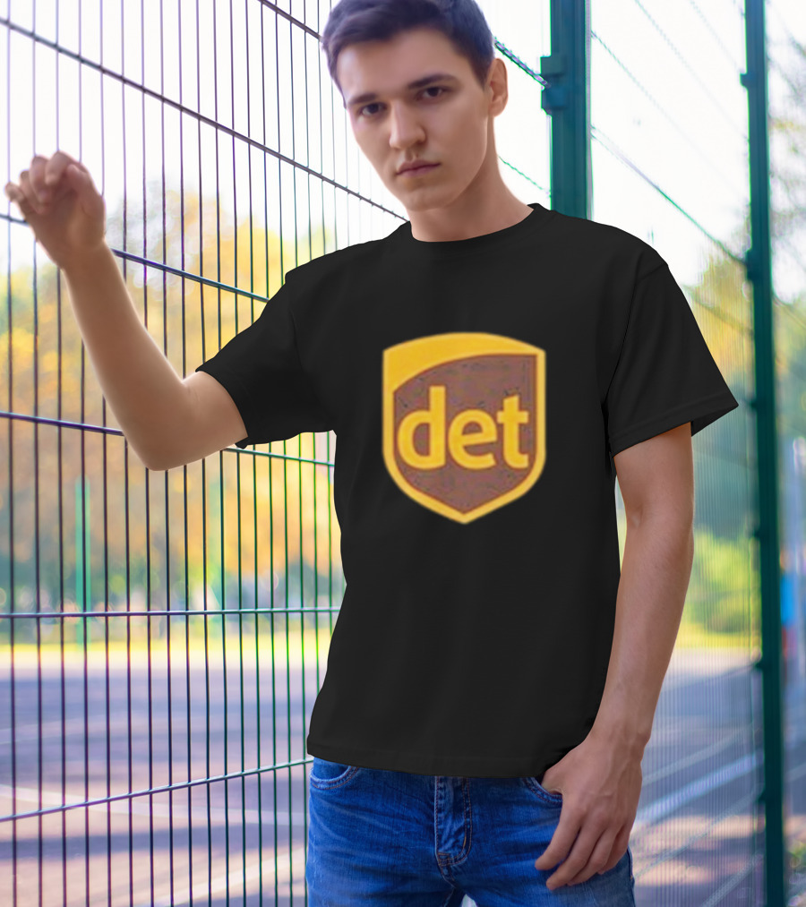 Amon-Ra Wearing Det Saint Brown Football T-Shirt