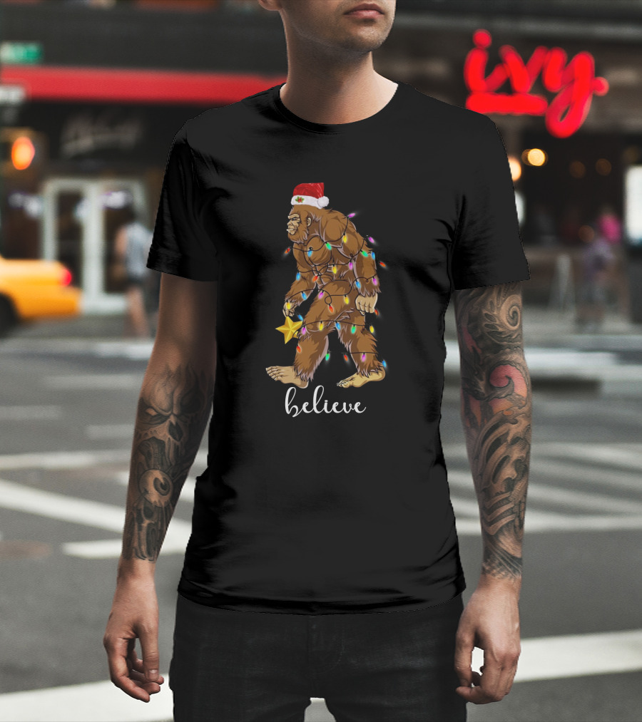 Bigfoot Christmas Lights Believe With Santa Hat And Star T-Shirt
