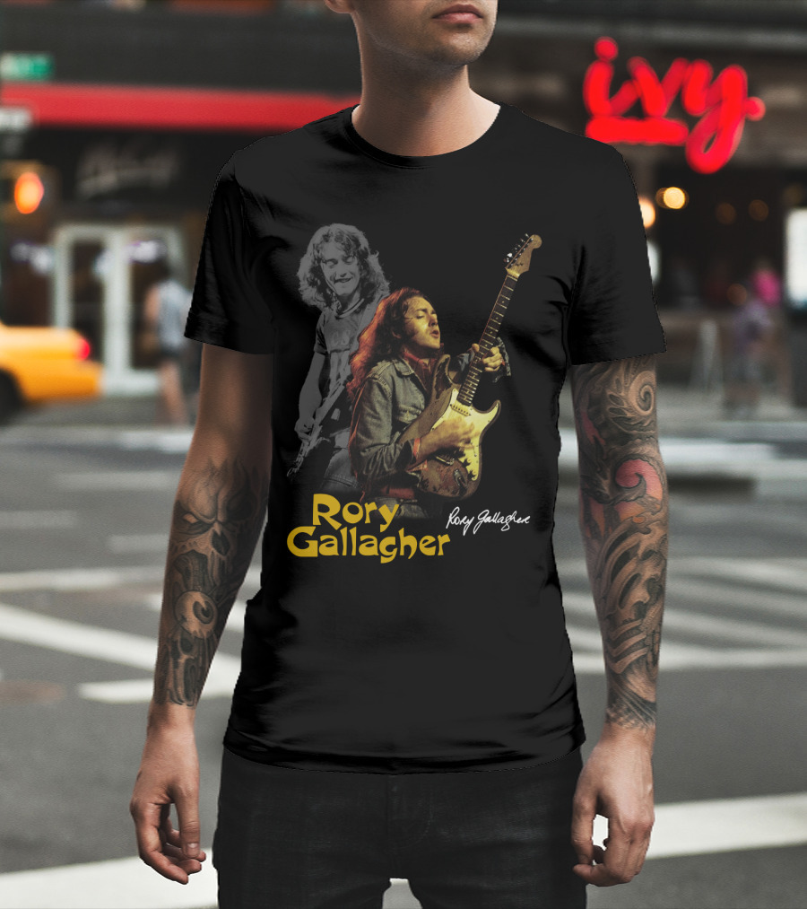 Rory Gallagher Playing Electric Guitar With Signature T-Shirt