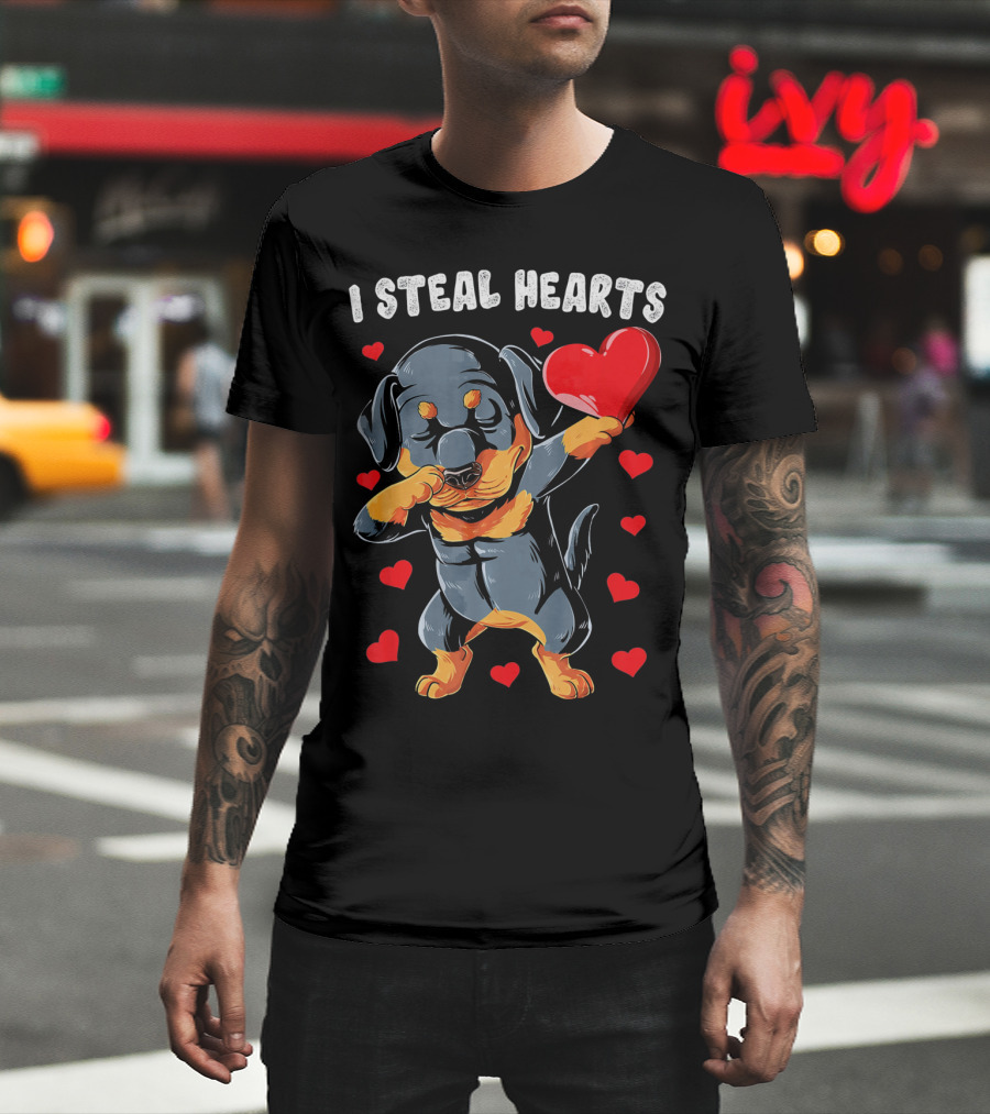 Dabbing Rottweiler Holding Heart Surrounded By I Steal Hearts Text T-Shirt
