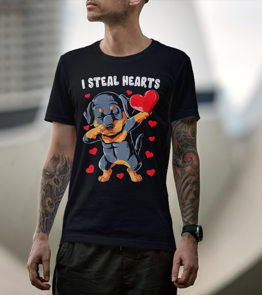 Dabbing Rottweiler Holding Heart Surrounded By I Steal Hearts Text T-Shirt