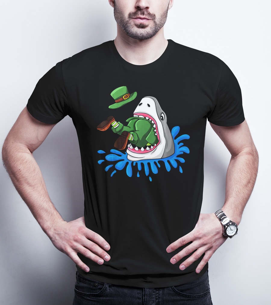 Shark Devours Leprechaun Wearing Green Outfit With Dropped Hat In Water Splash T-Shirt