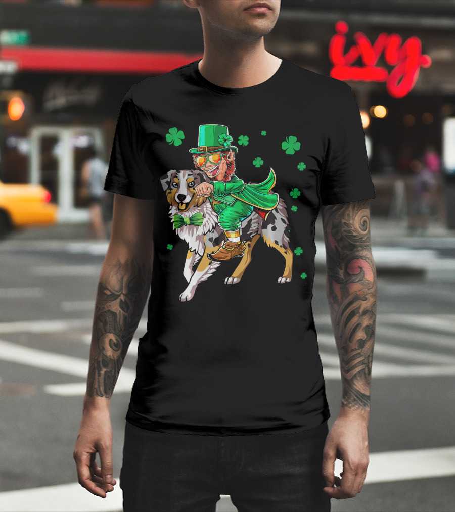 Leprechaun Riding Australian Shepherd With Shamrock Bow Tie And Clover Background T-Shirt