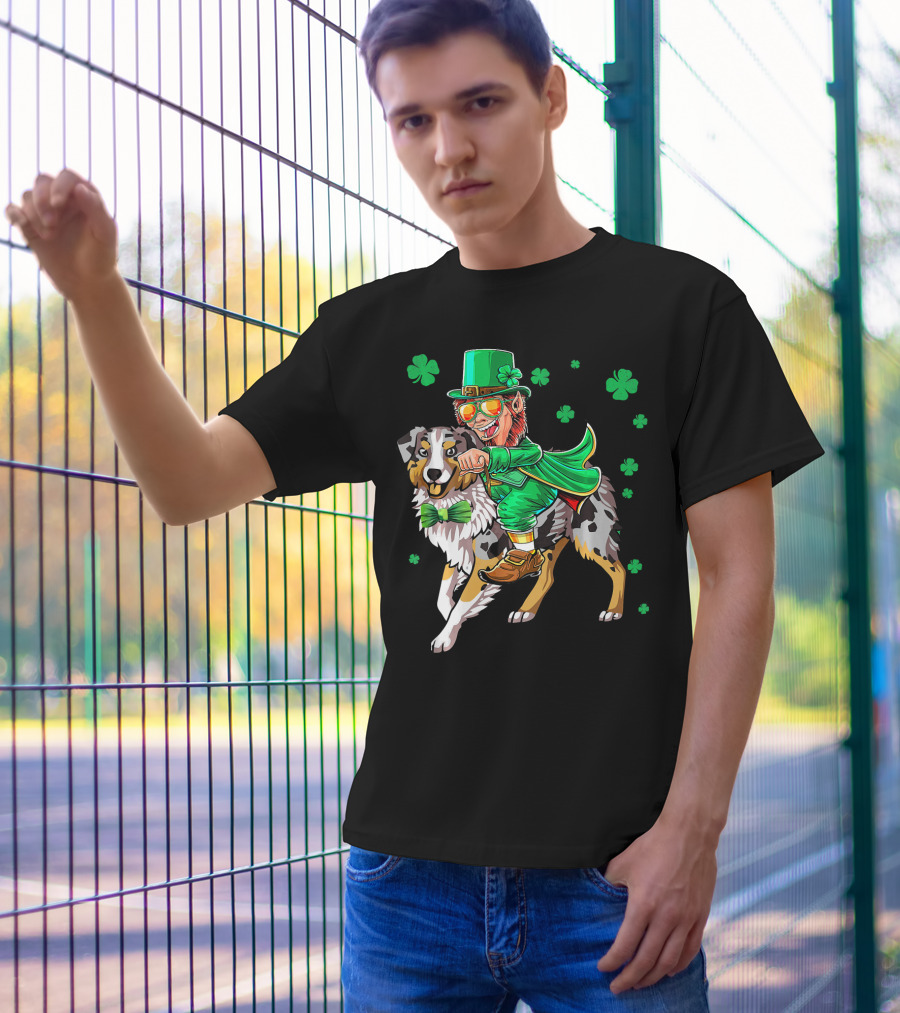 Leprechaun Riding Australian Shepherd With Shamrock Bow Tie And Clover Background T-Shirt