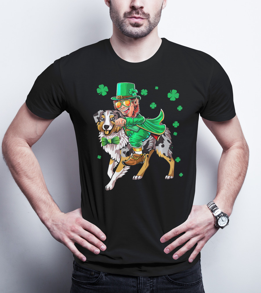 Leprechaun Riding Australian Shepherd With Shamrock Bow Tie And Clover Background T-Shirt