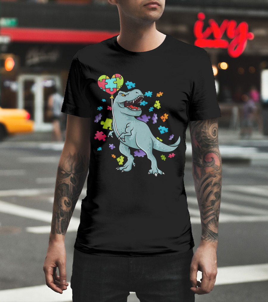 Autism Awareness Dinosaur With Puzzle Heart Balloon And Colorful Puzzle Pieces T-Shirt