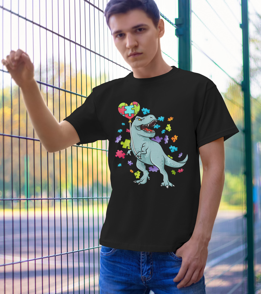 Autism Awareness Dinosaur With Puzzle Heart Balloon And Colorful Puzzle Pieces T-Shirt