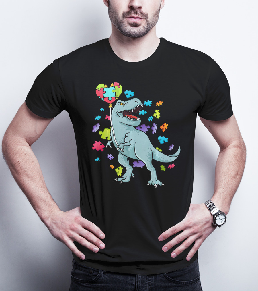Autism Awareness Dinosaur With Puzzle Heart Balloon And Colorful Puzzle Pieces T-Shirt