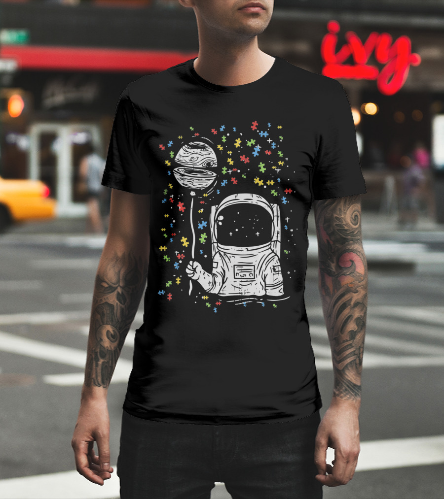 Astronaut Holding Planet Balloon With Puzzle Pieces For Autism Awareness T-Shirt