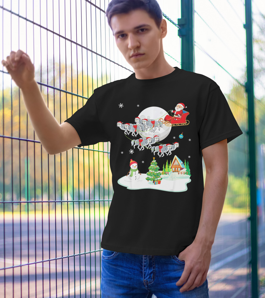 Santa Claus Sleigh Riding Over Snowman And Christmas Scene With Wolves T-Shirt