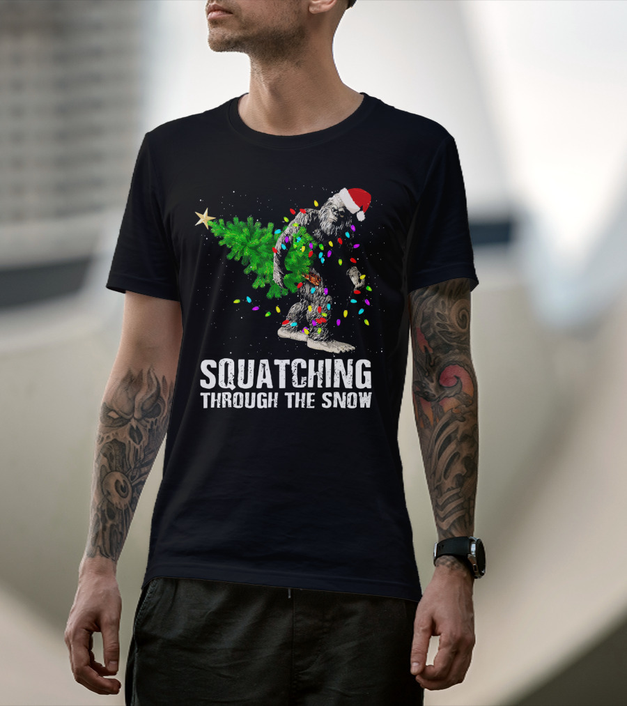 Squatching Through The Snow Bigfoot Christmas Lights Santa Hat T-Shirt