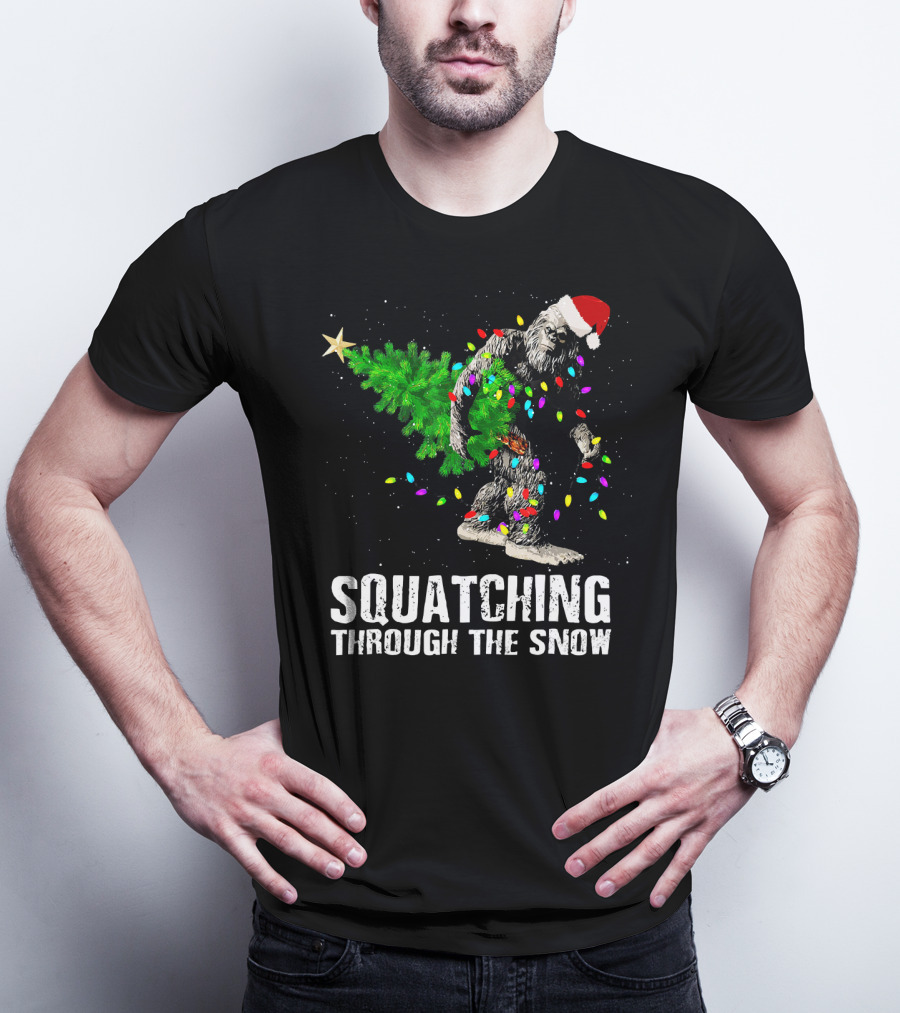 Squatching Through The Snow Bigfoot Christmas Lights Santa Hat T-Shirt