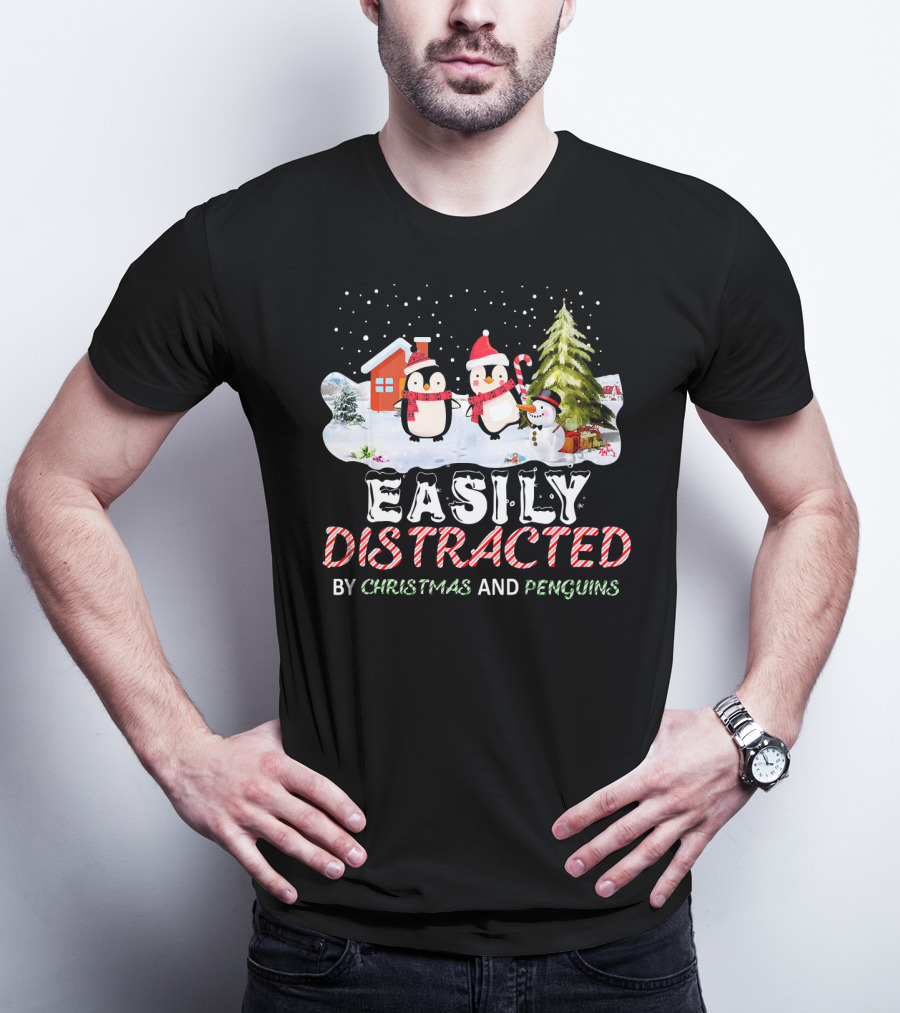 Easily Distracted By Christmas And Penguins In Winter Wonderland With Snowman House And Tree T-Shirt
