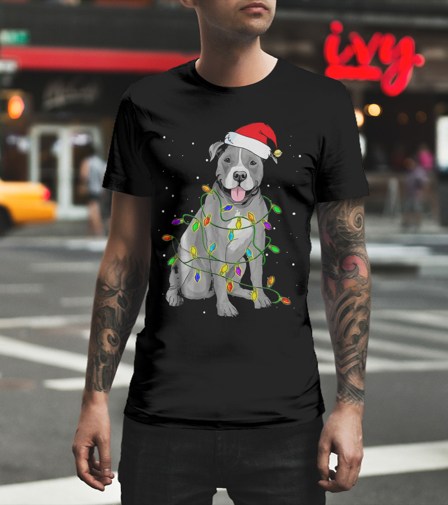 Pitbull In Santa Hat Wrapped In Christmas Lights With Snowy Background T-Shirt
