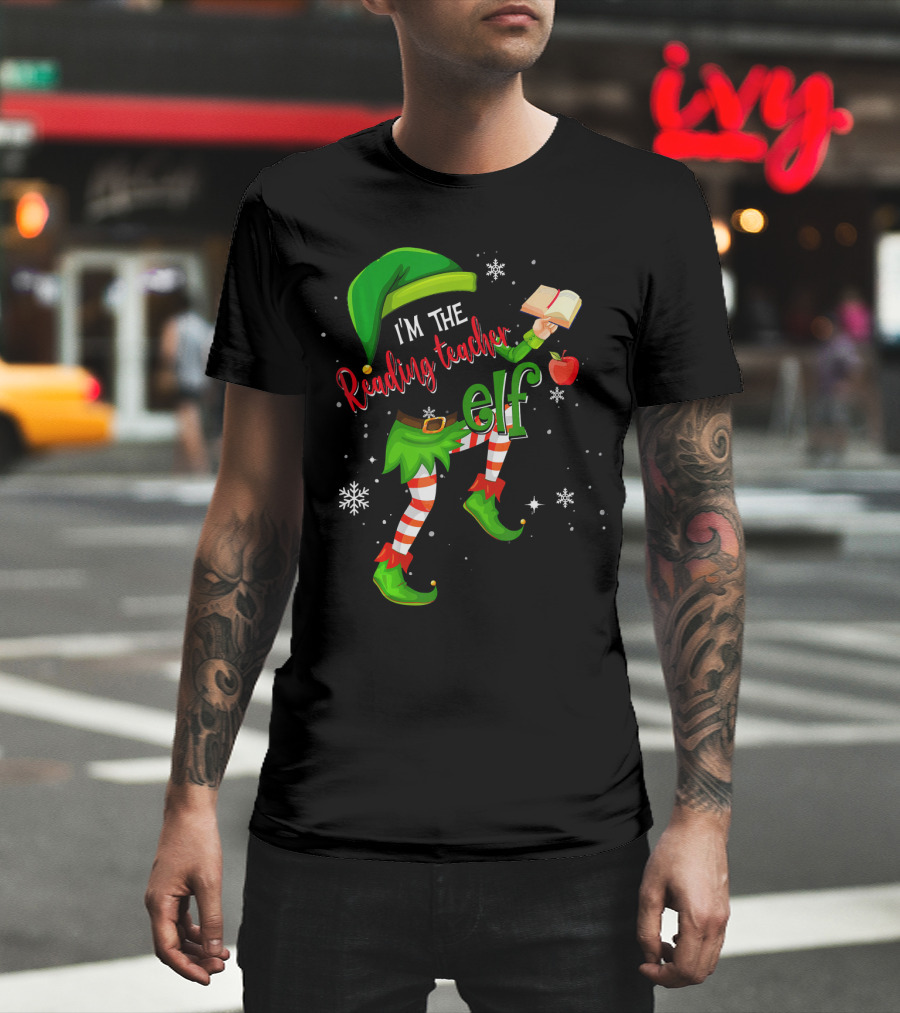 I'm The Reading Teacher Elf Holding Book Apple Wearing Elf Outfit Snowflakes T-Shirt