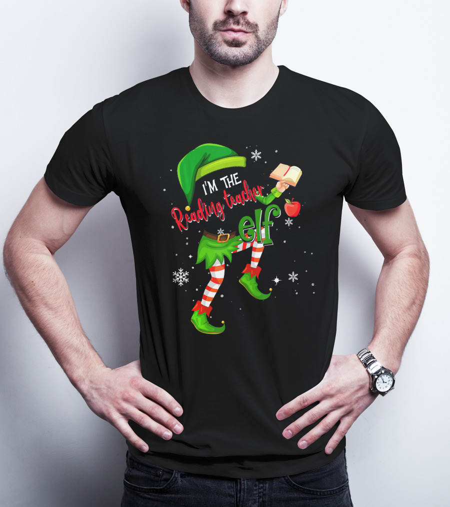 I'm The Reading Teacher Elf Holding Book Apple Wearing Elf Outfit Snowflakes T-Shirt