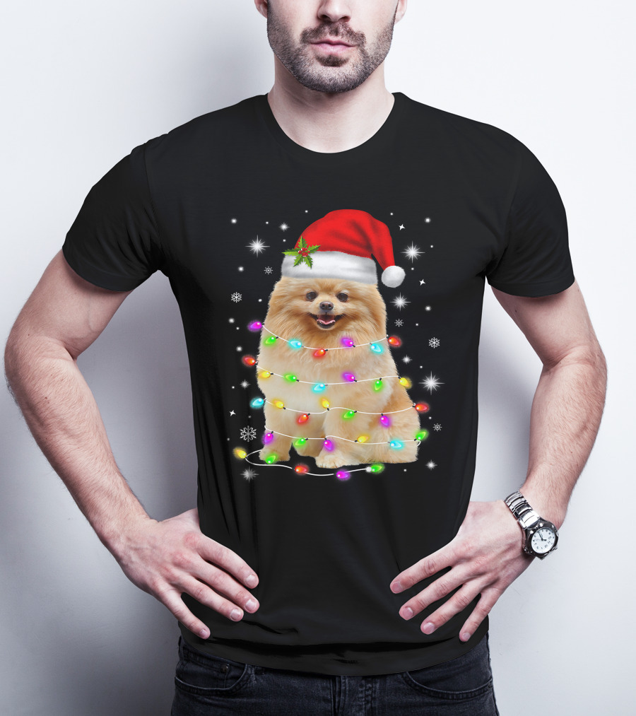 Pomeranian Pup Wrapped In Christmas Lights With Santa Hat And Festive Glow T-Shirt